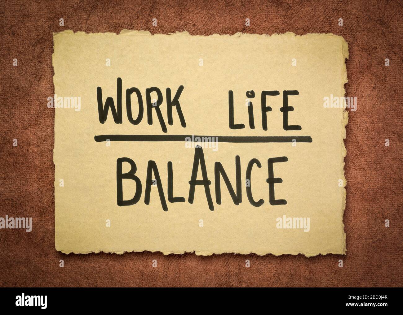 work and life balance - writing on a handmade textured paper, personal ...
