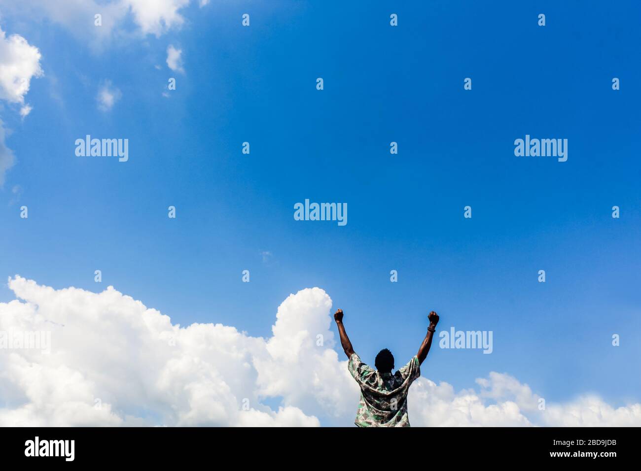 One Young Adult man Facing the Cloud and talking to God Stock Photo - Alamy