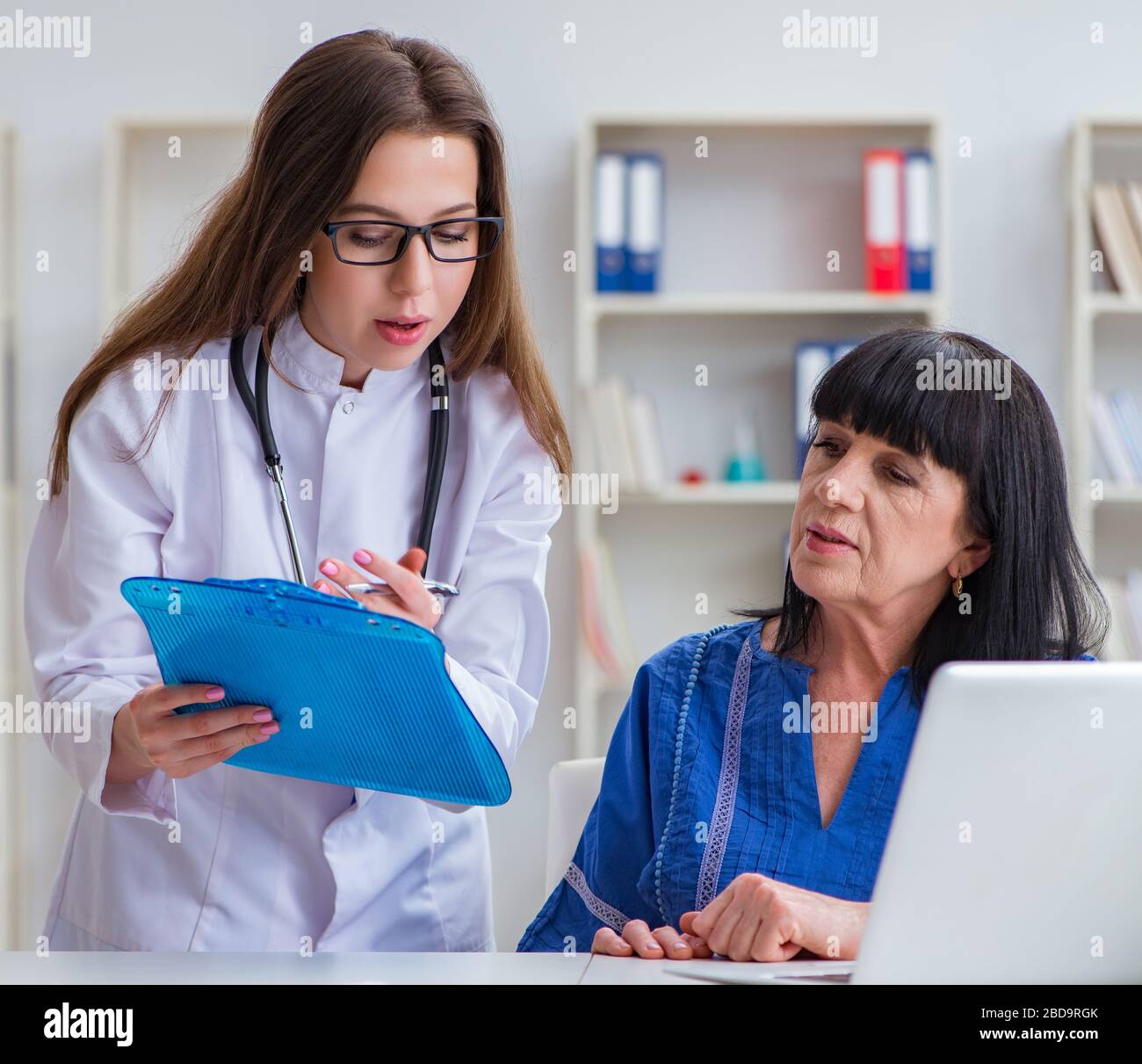 The senior patient visiting doctor for regular check-up Stock Photo - Alamy