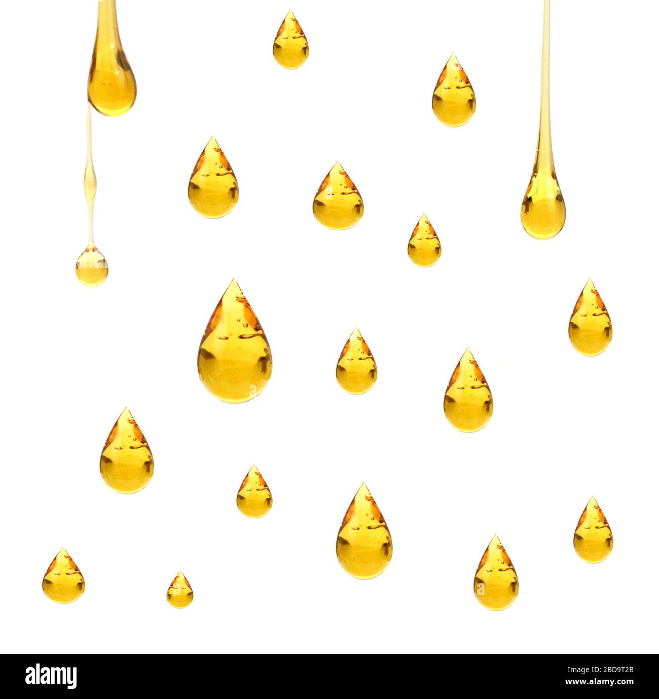 Oil drop isolated on white background Stock Photo - Alamy