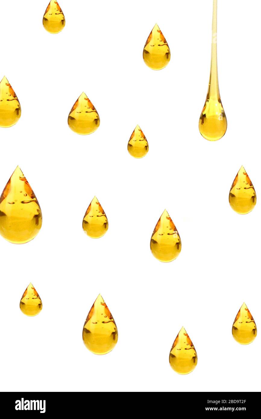 Oil drop isolated on white background Stock Photo - Alamy
