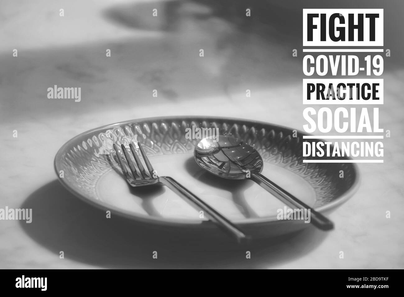 Conceptual still life photo of empty plate with cutlery with the ...