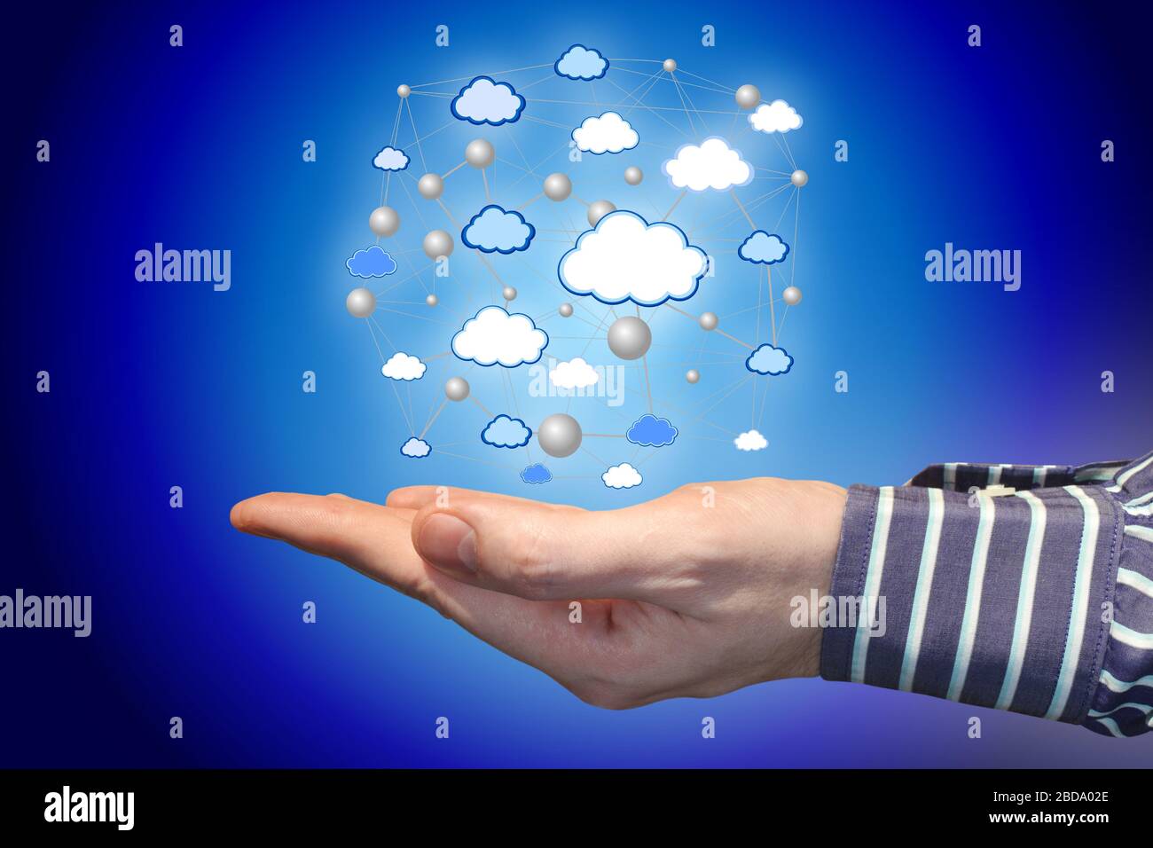 Hand, blue background, cloud computing concept Stock Photo - Alamy