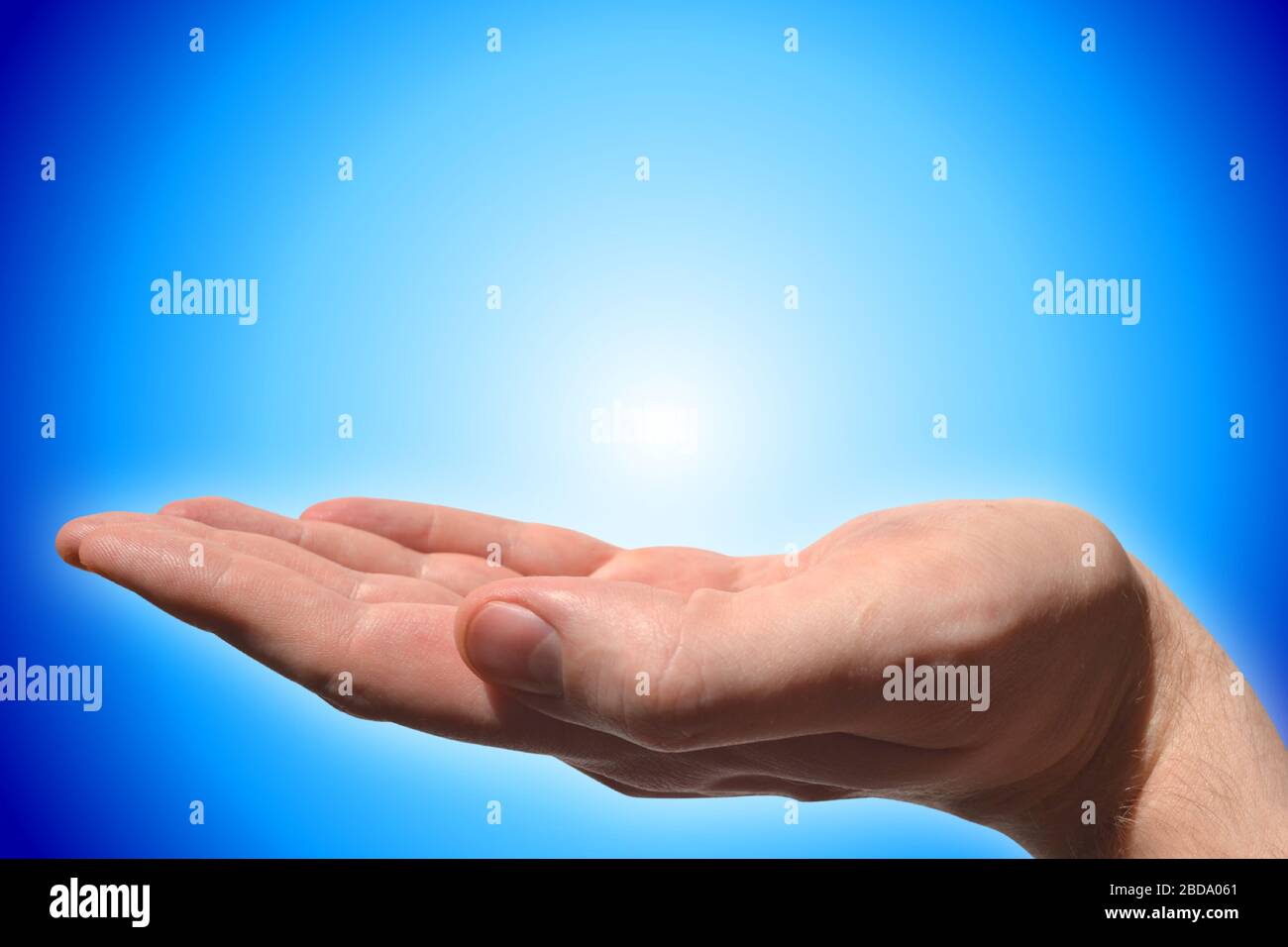 Presentation concept, hand, blue background Stock Photo - Alamy