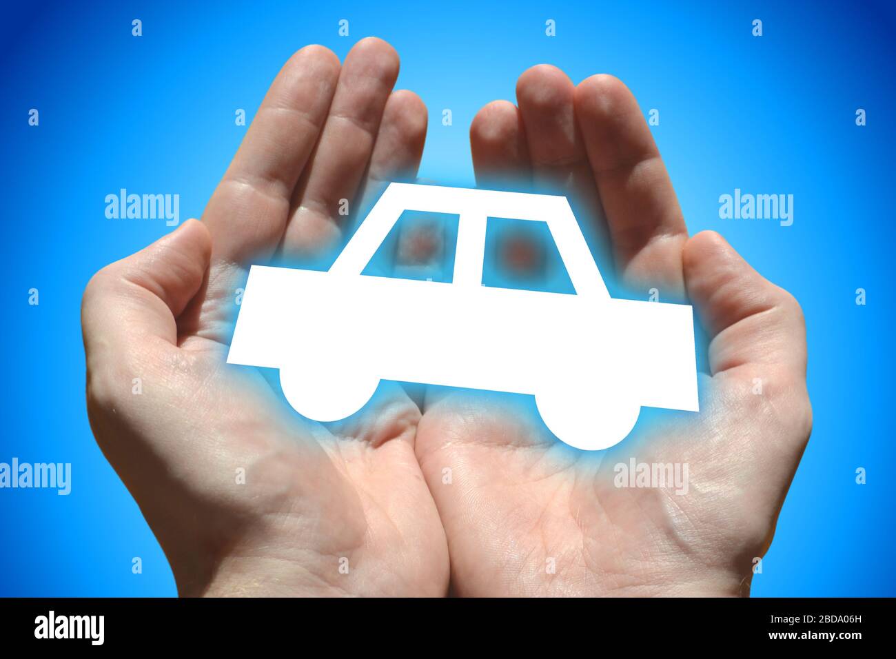 Car insurance concept, hands, blue background Stock Photo - Alamy