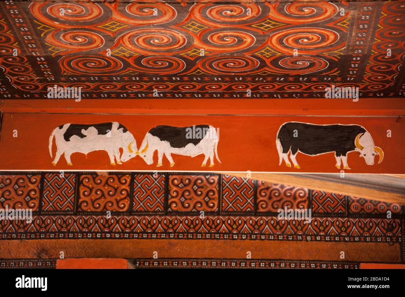 Traditional ornament imaging of buffalo drawn on the traditional house ...