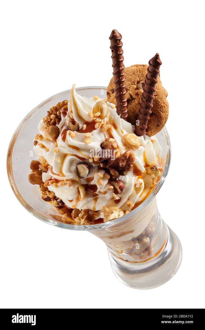 Top down view on a twirl of vanilla ice cream sprinkled with assorted ...