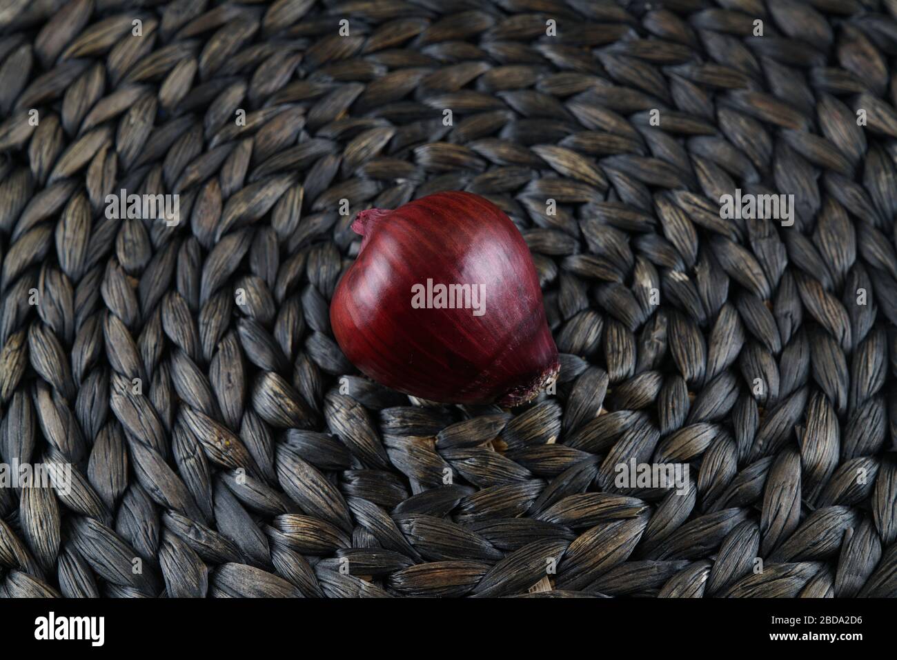 Red onion on dark background Stock Photo - Alamy