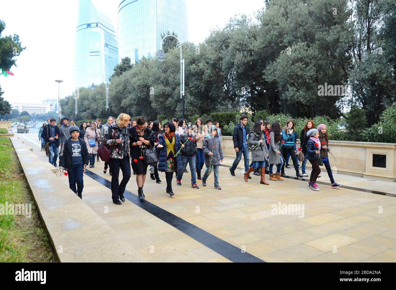 People and The tourists visiting Alley of Martyrs on anniversary of ...