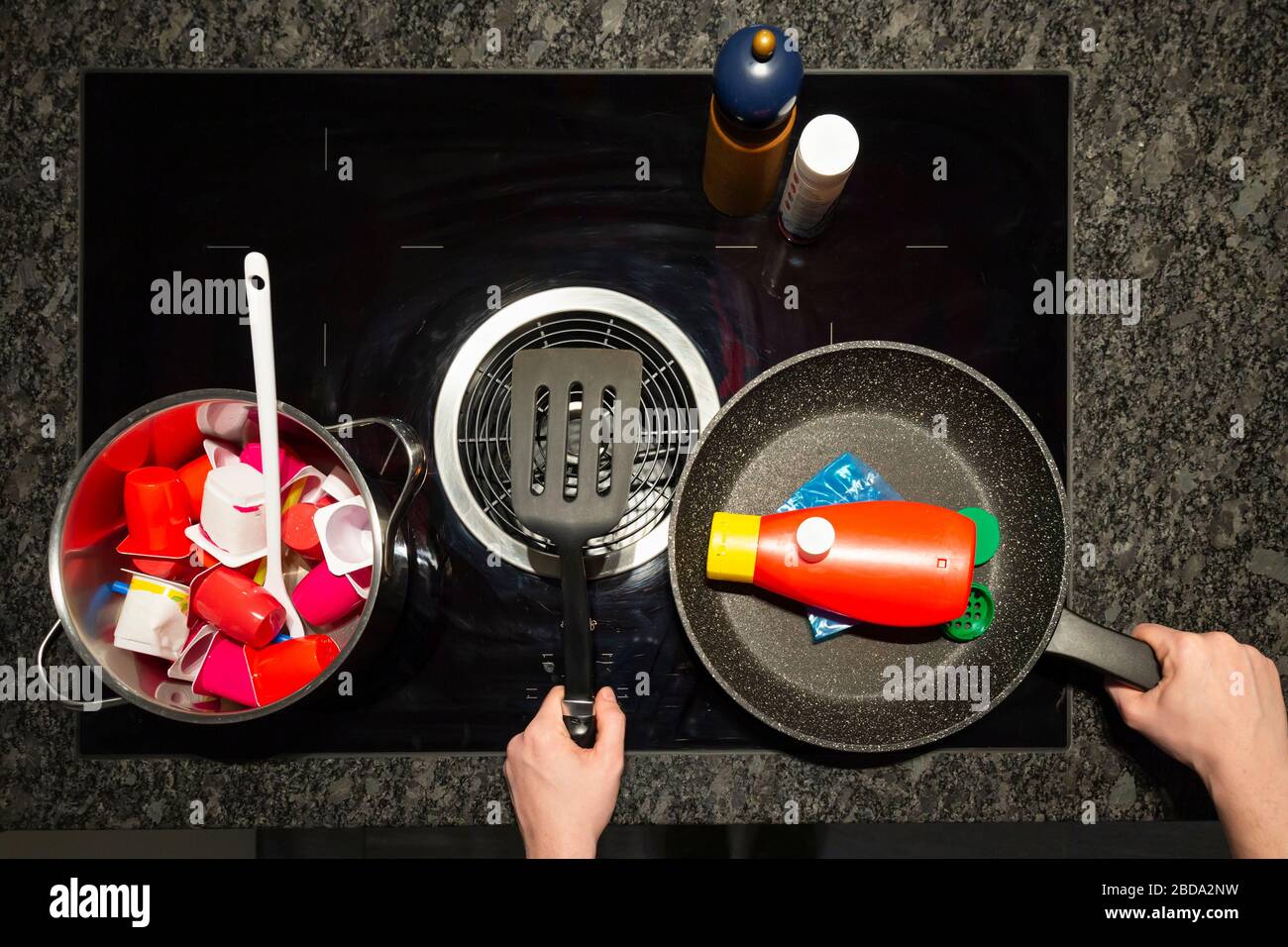 Concept of food pollution with plastic waste. Top view of a persons ...