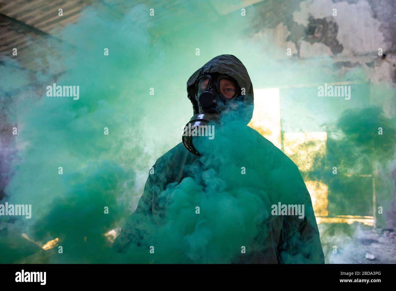 Post apocalyptic survivor in gas mask in the smoke. Environmental ...