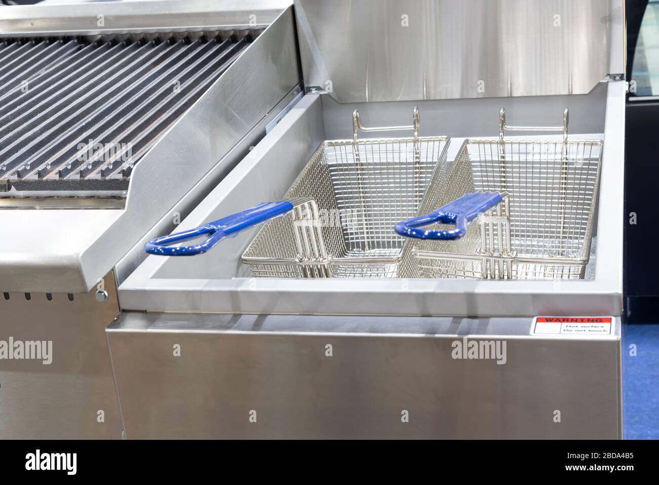 New empty modern professional deep fryer basket for kitchen restaurant ...