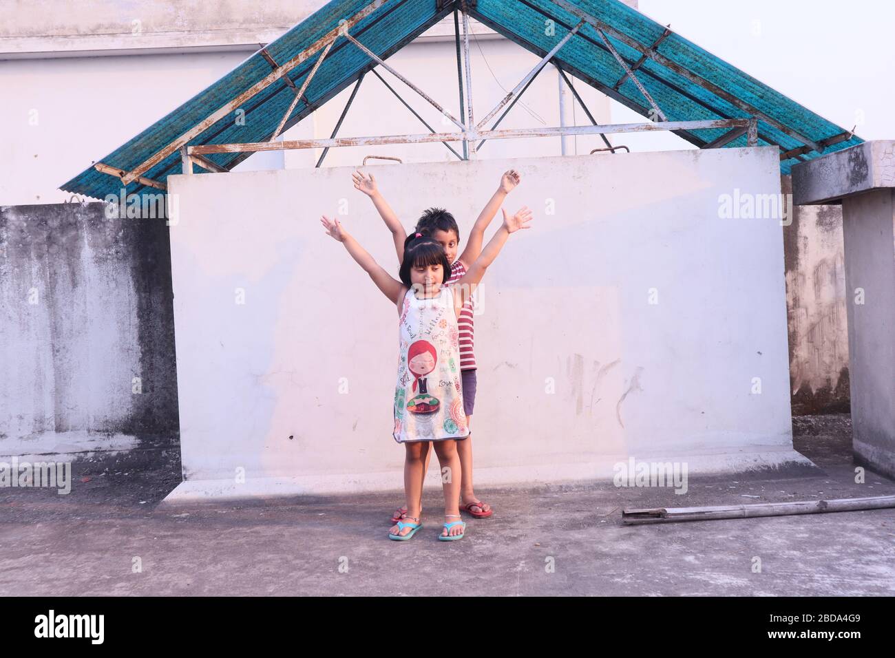 children playing on roof Stock Photo - Alamy