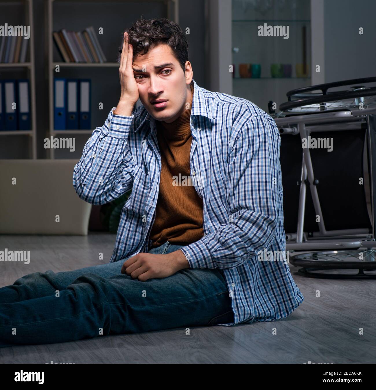 Man falling off chair hi-res stock photography and images - Alamy