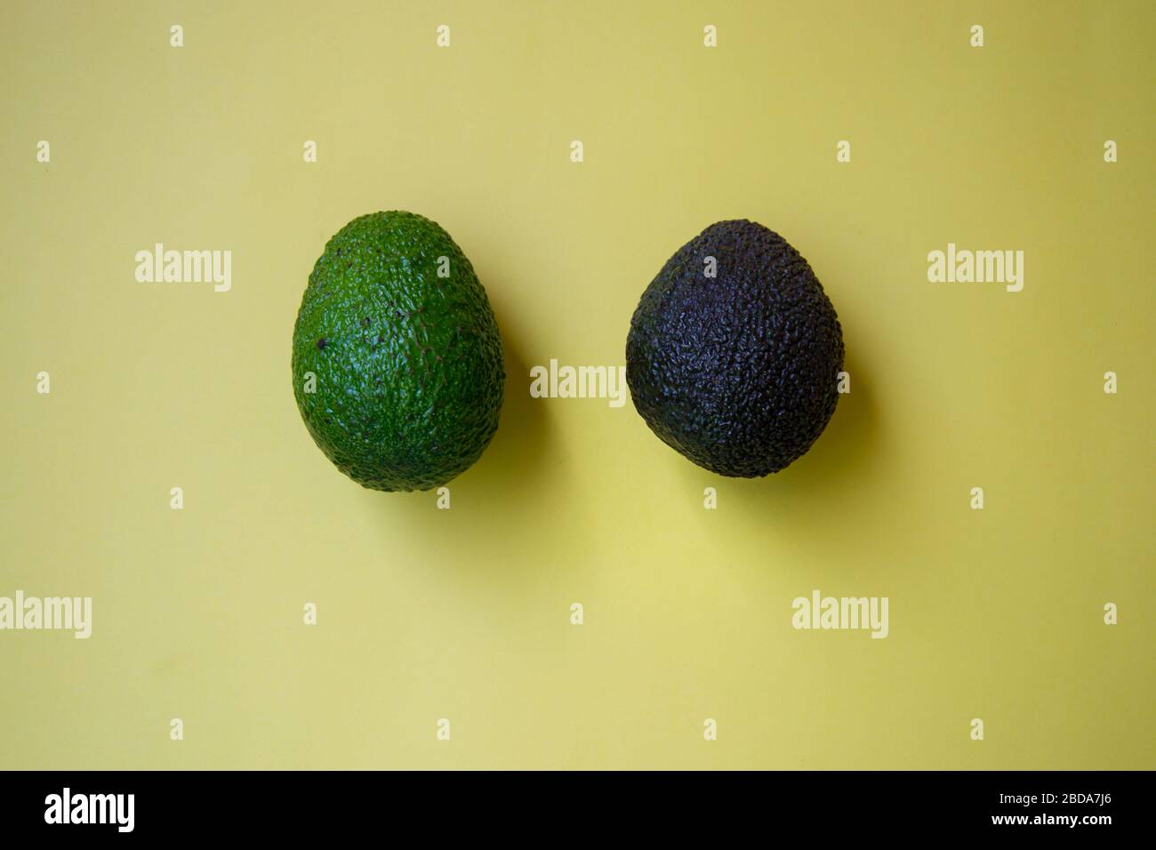 Whole green ripe avocado, close-up fruit, healthy eating concept ...