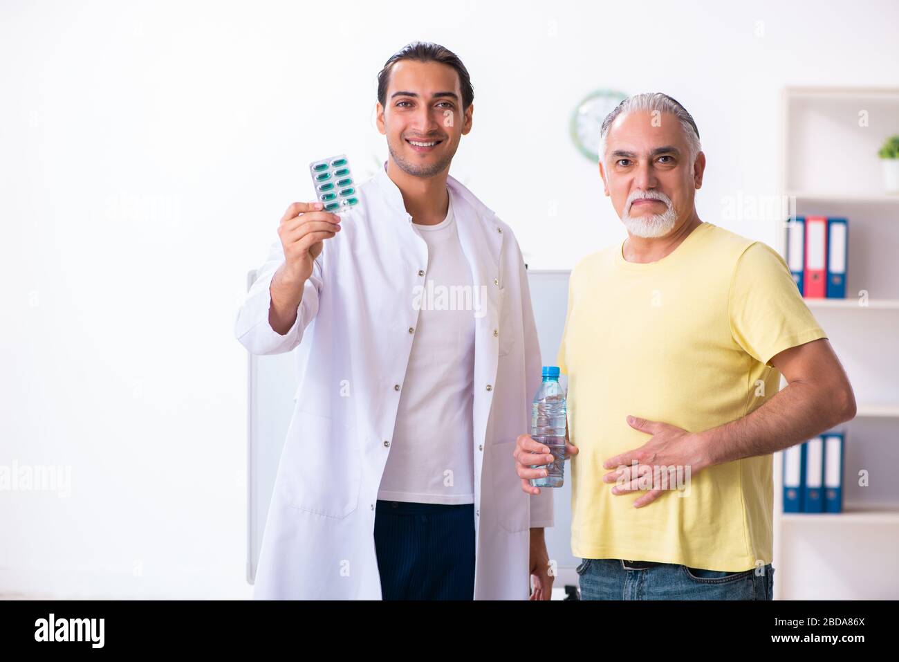 The doctor dietician giving advices to fat overweight patient Stock ...