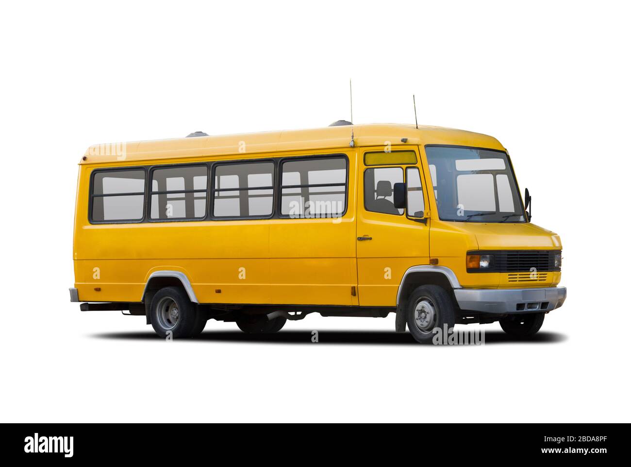 Yellow school bus side view isolated on white Stock Photo - Alamy