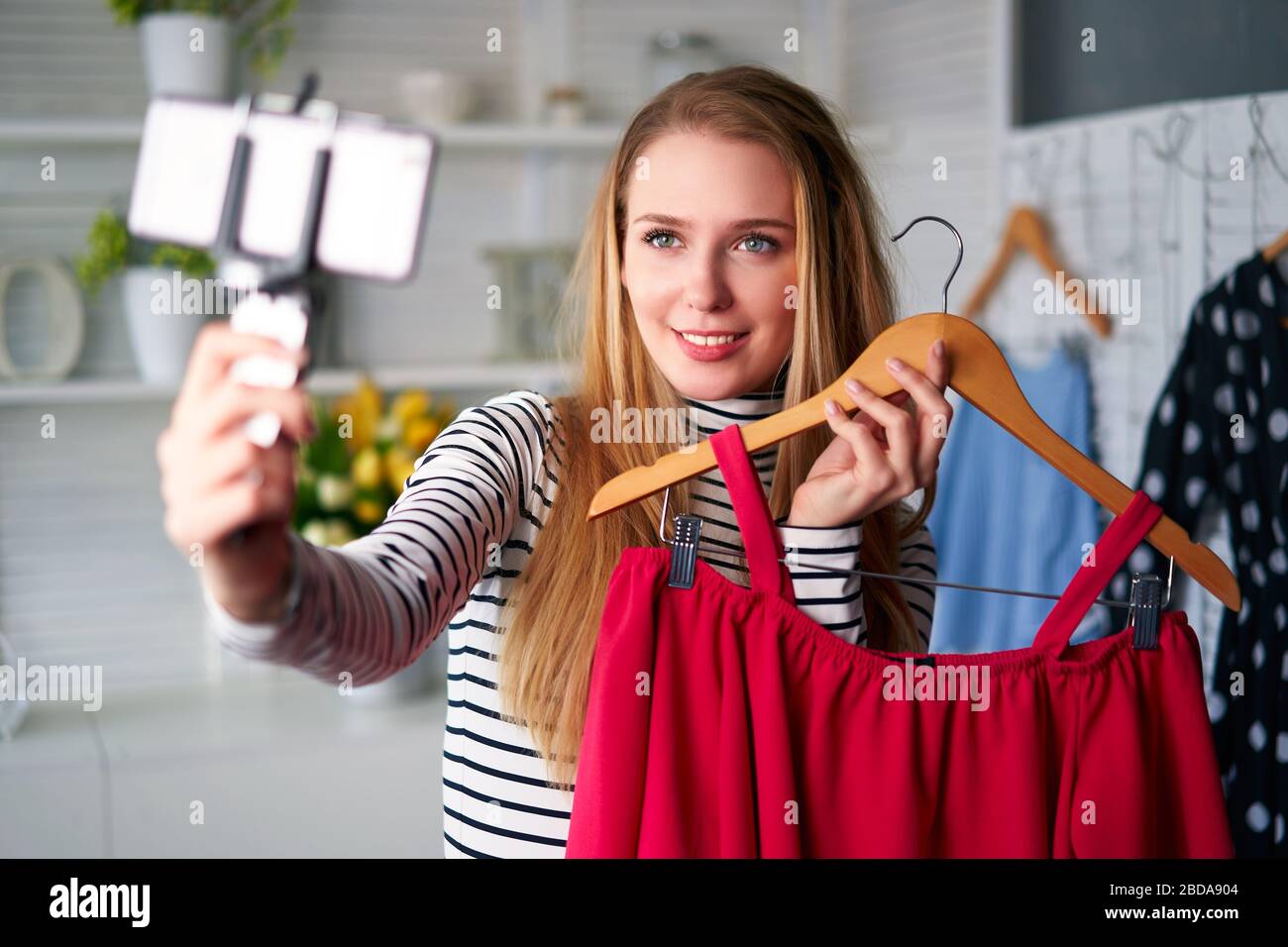 Fashion blogger woman in jeans and turtleneck showing casual colorful ...