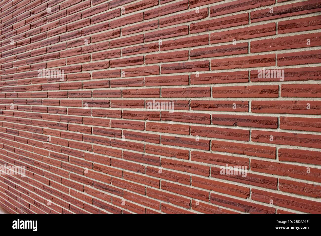 Vintage red color rustic texture brick wall background with striped ...