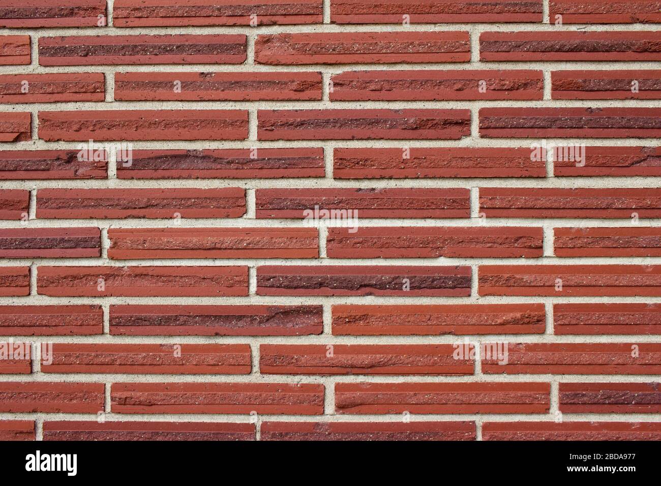 Vintage red color rustic texture brick wall background with striped ...