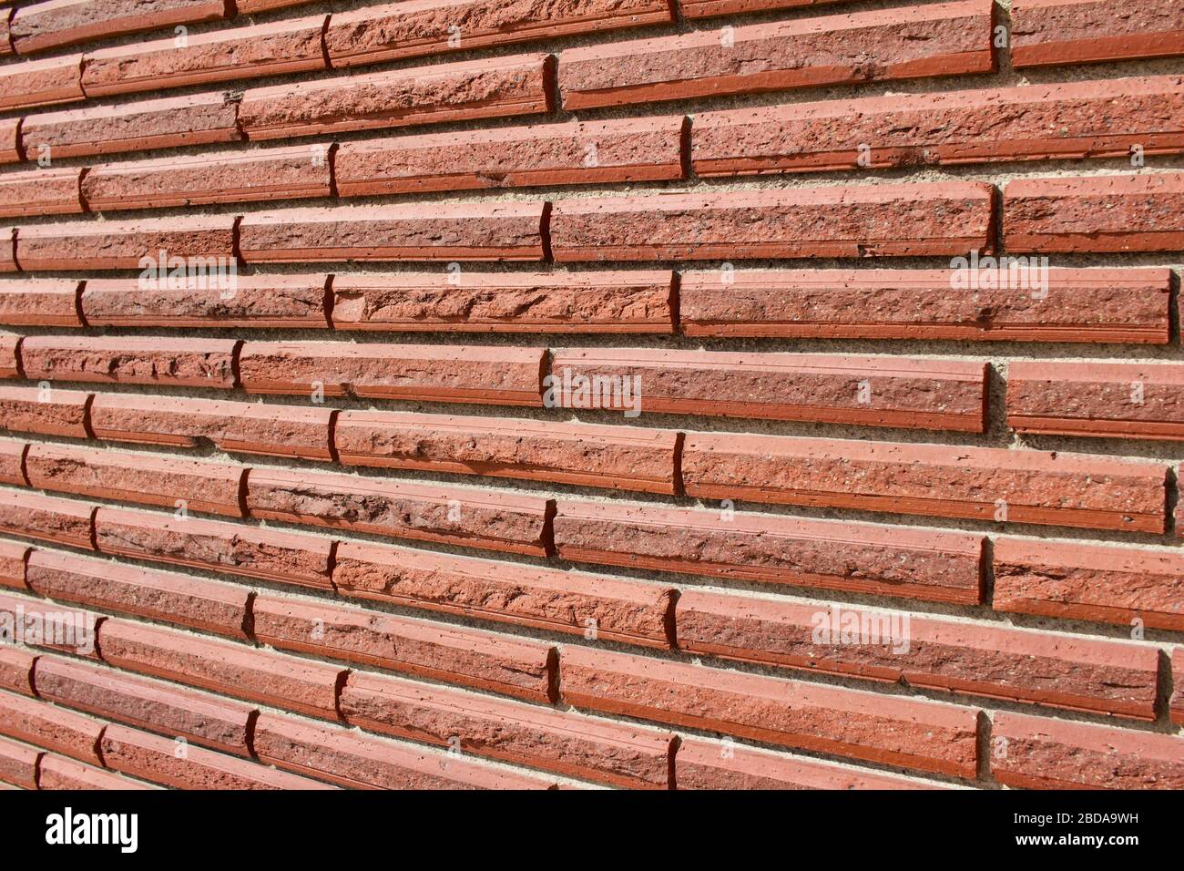 Vintage red color rustic texture brick wall background with striped ...