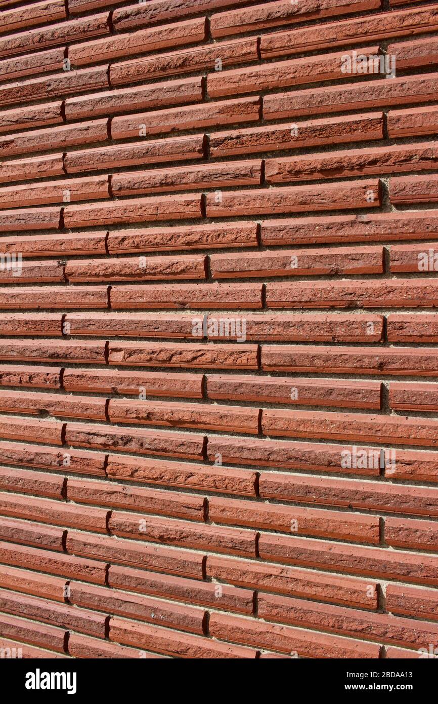 Vintage red color rustic texture brick wall background with striped ...