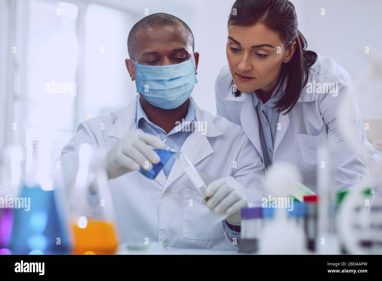 Professional smart scientists working together in team Stock Photo - Alamy