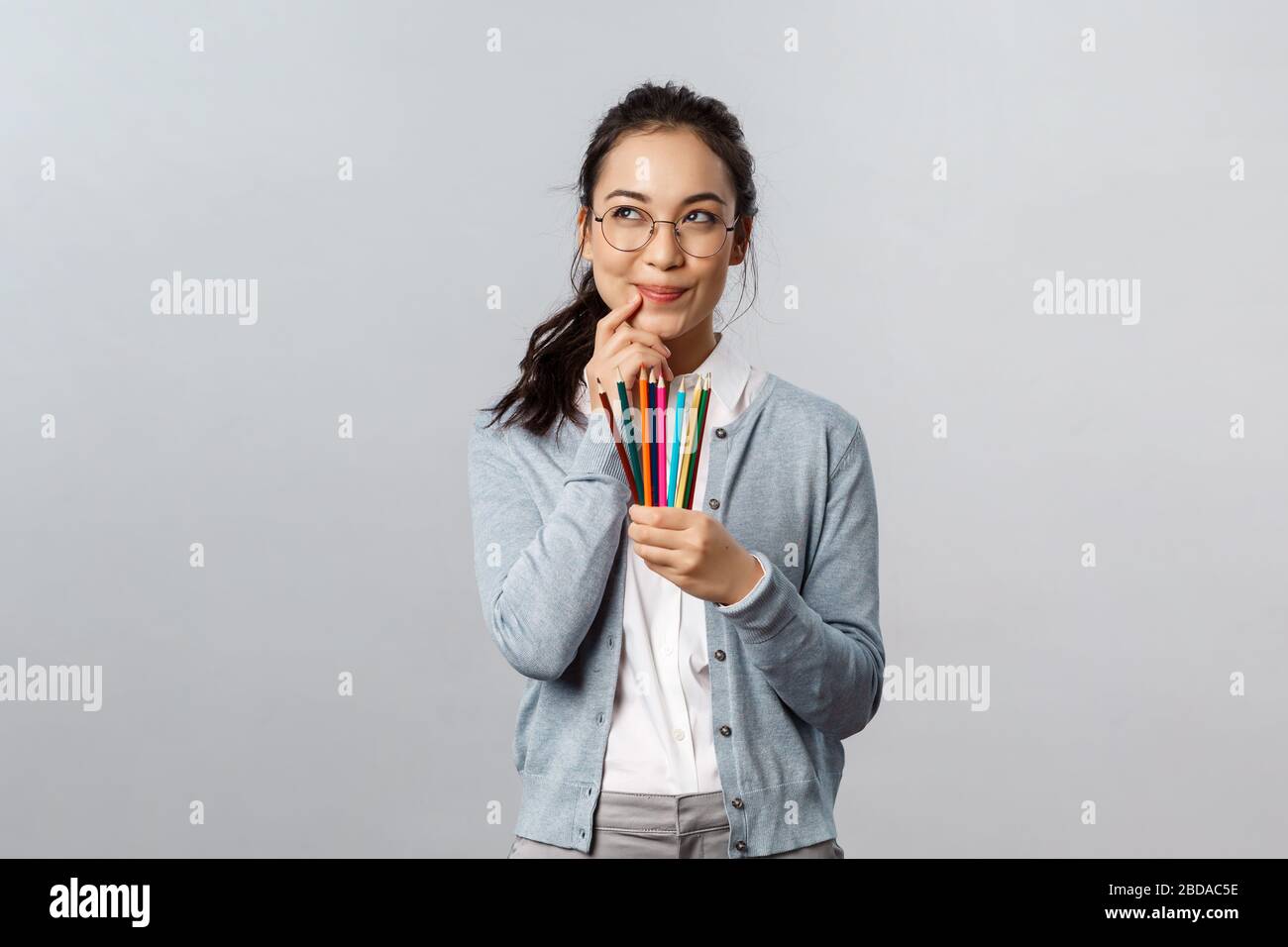 Hobbies, creativity and art concept. Scheming, creative and smart young ...