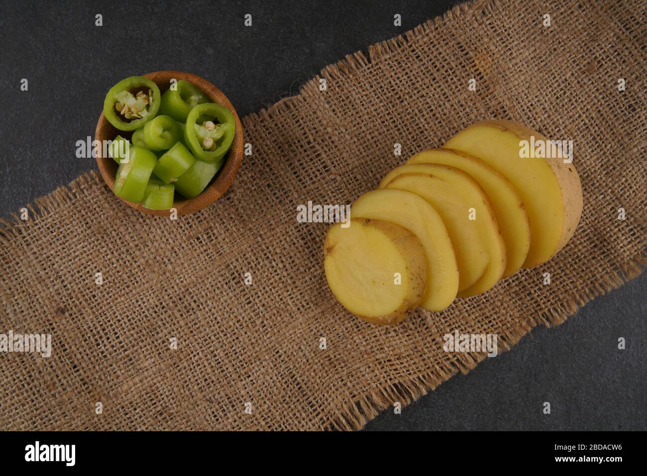 Fresh patato on dark background Stock Photo - Alamy