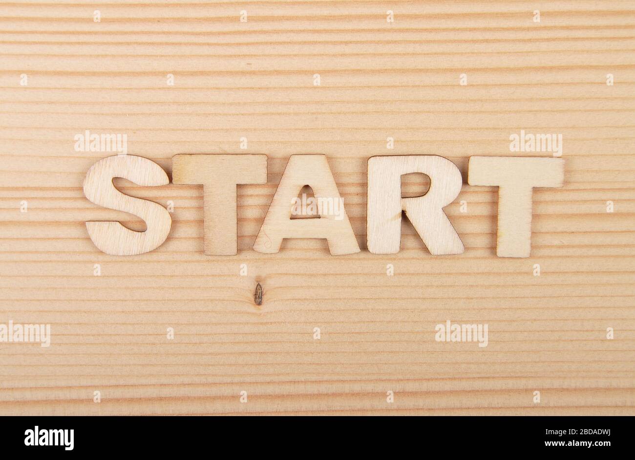 Term from wooden letters on pale wood Stock Photo - Alamy