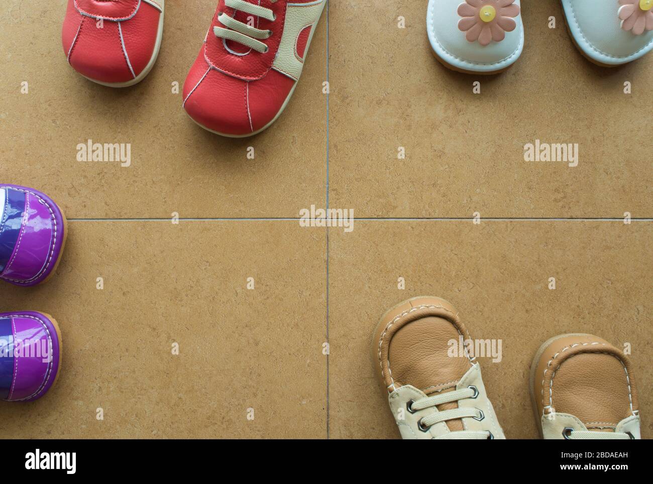 Meeting of children, Represent through their shoes Stock Photo - Alamy