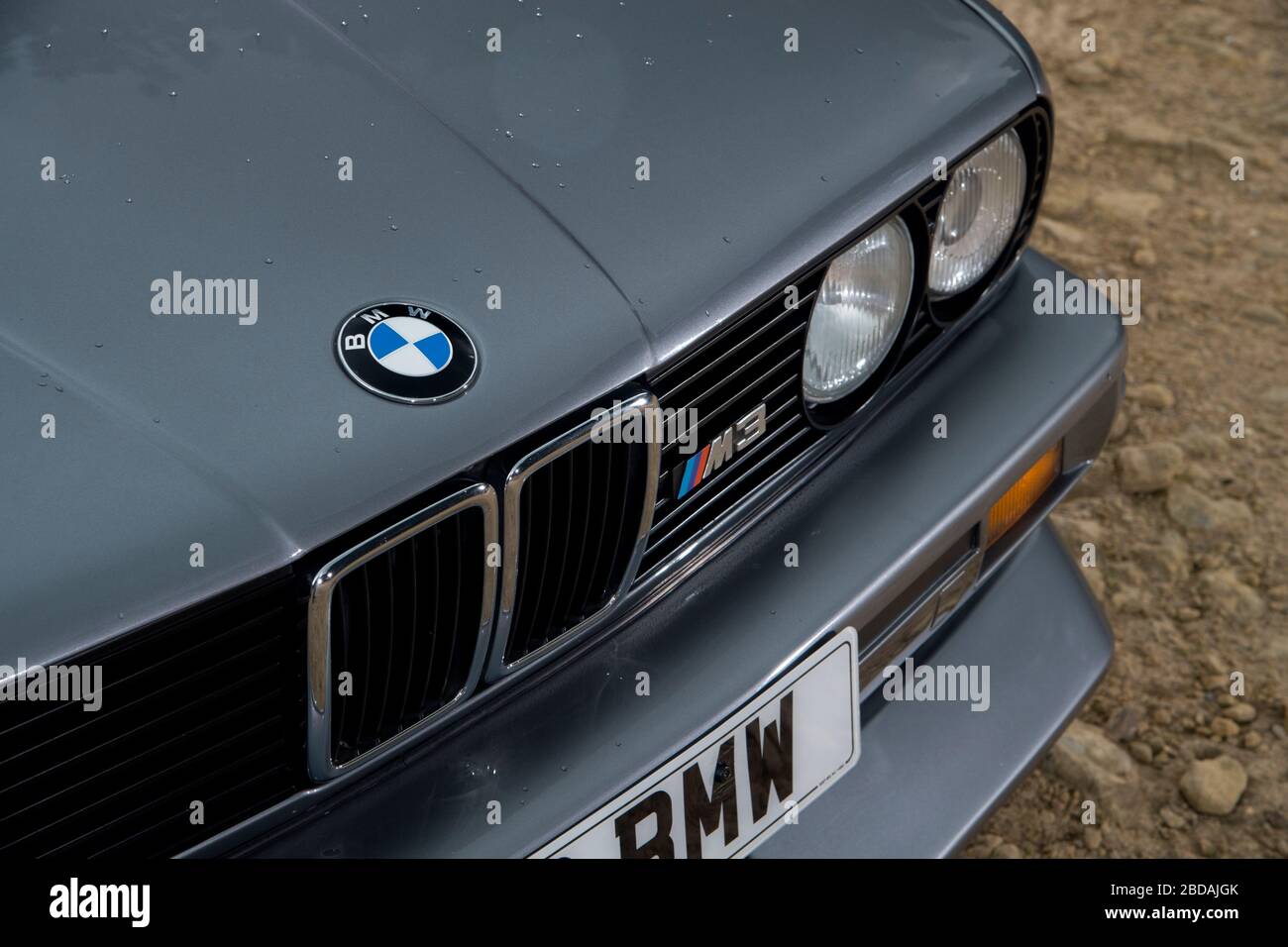BMW E30 M3 1980s super saloon in Dolphin Grey Stock Photo - Alamy