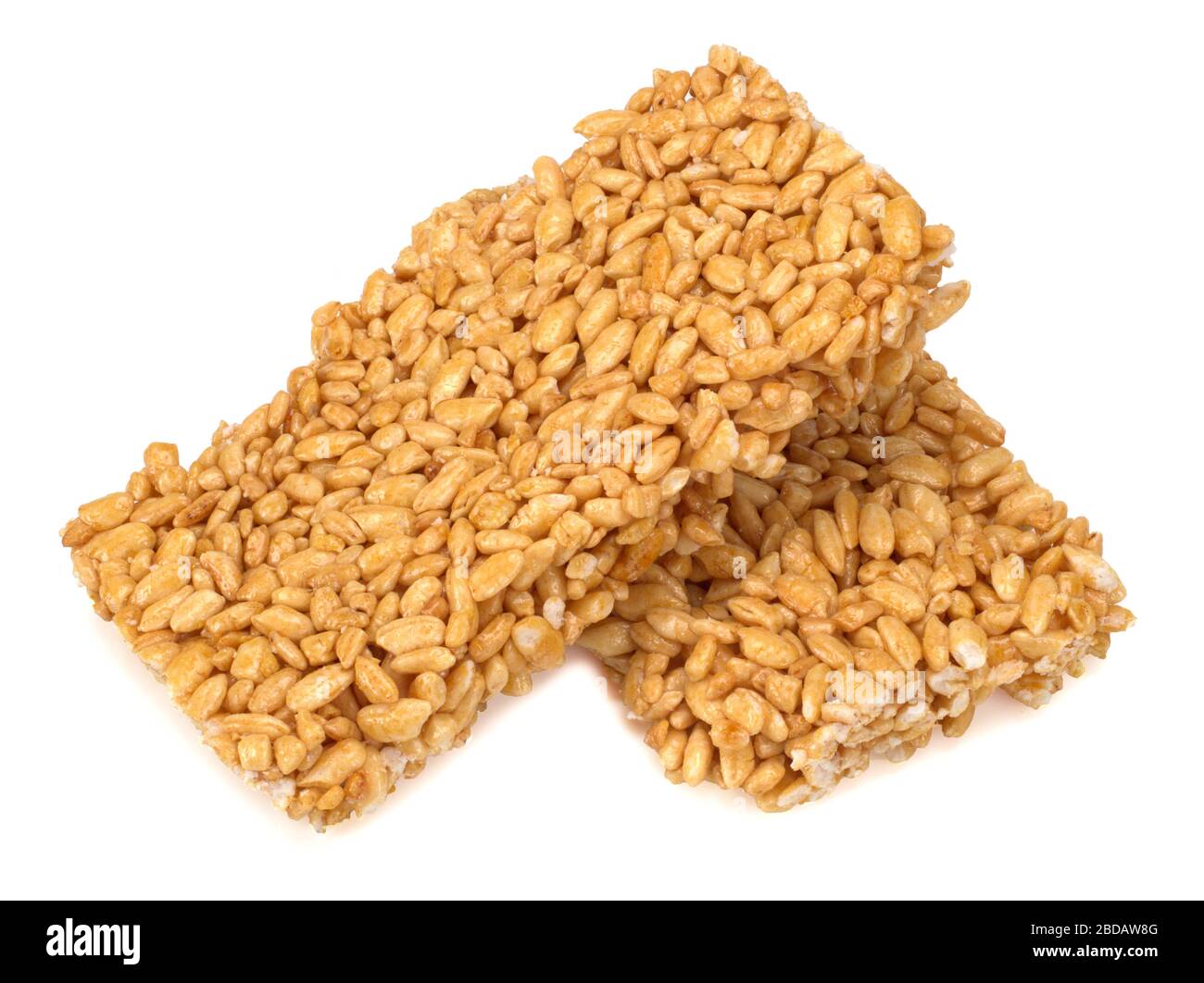 pressed sweet puffed rice on white background Stock Photo - Alamy