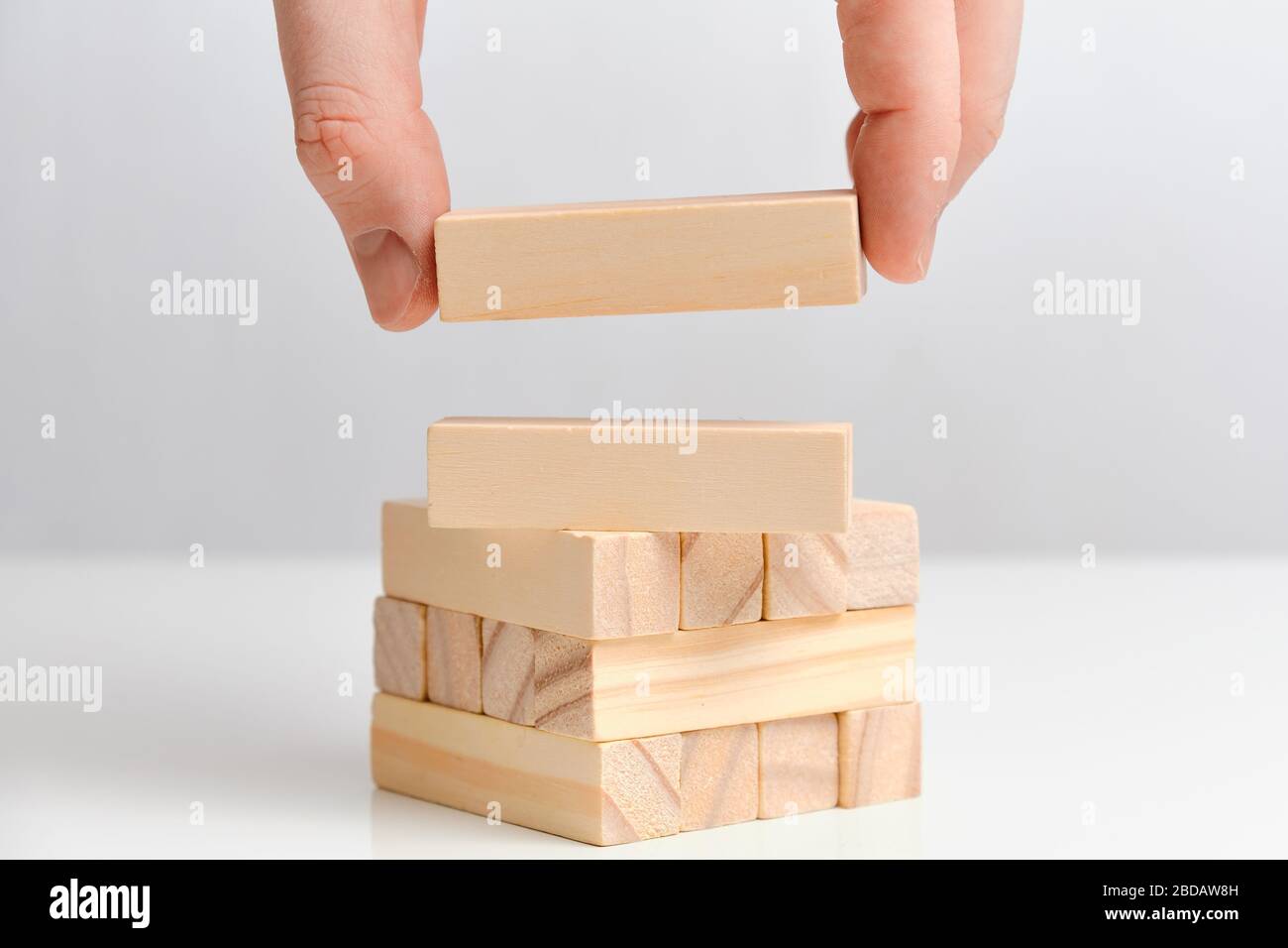 Two wooden blocks hi-res stock photography and images - Alamy