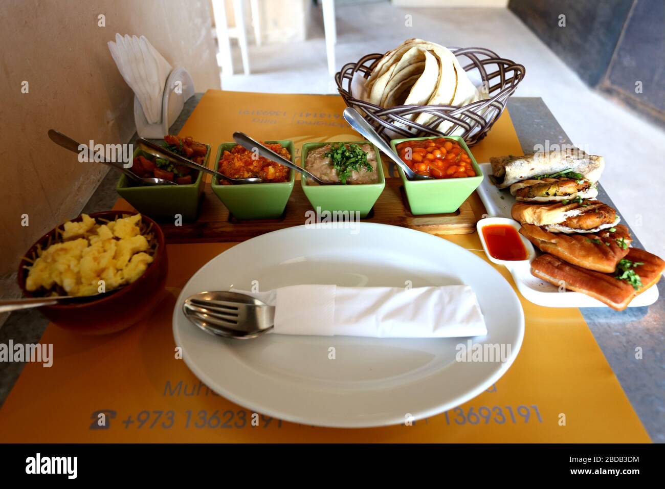 Bahrain breakfast of beans, eggs and flat bread in the Saffron ...