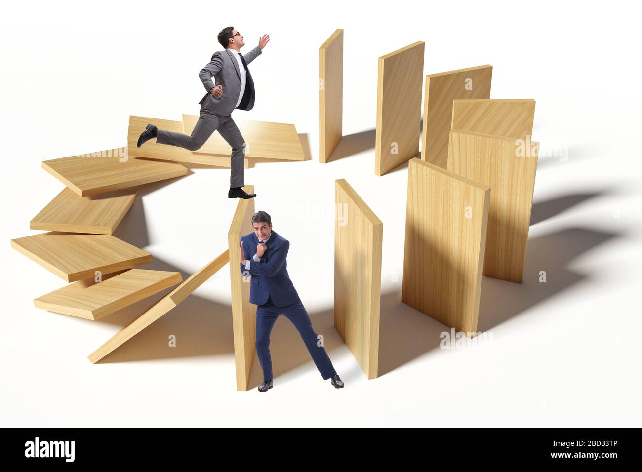 The domino effect and competition concept Stock Photo - Alamy