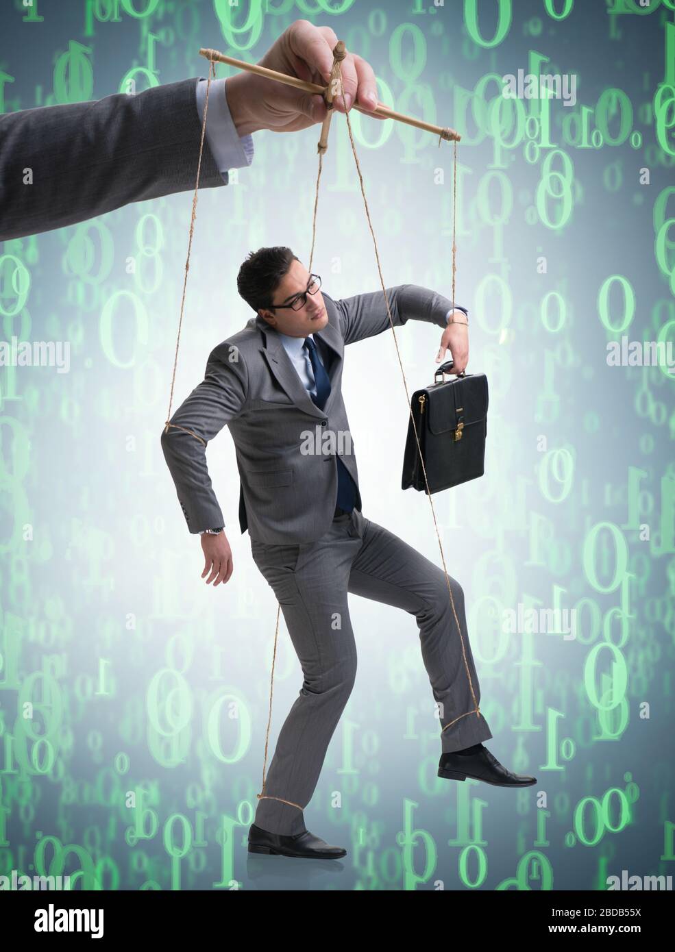The businessman puppet being manipulated by boss Stock Photo - Alamy