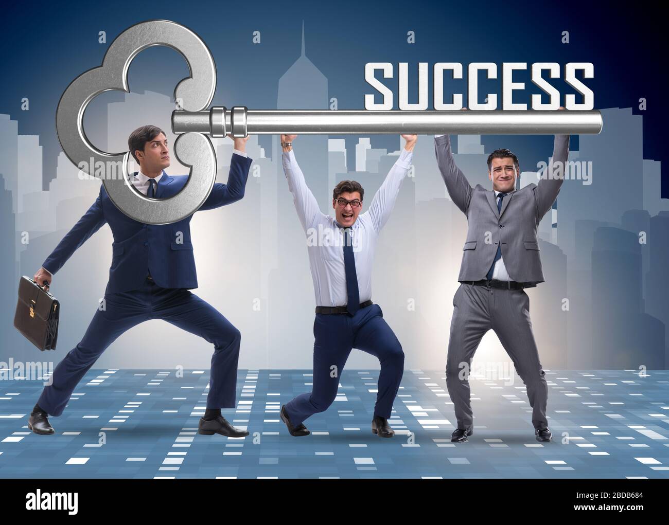 The businessmen holding giant key in business concept Stock Photo - Alamy