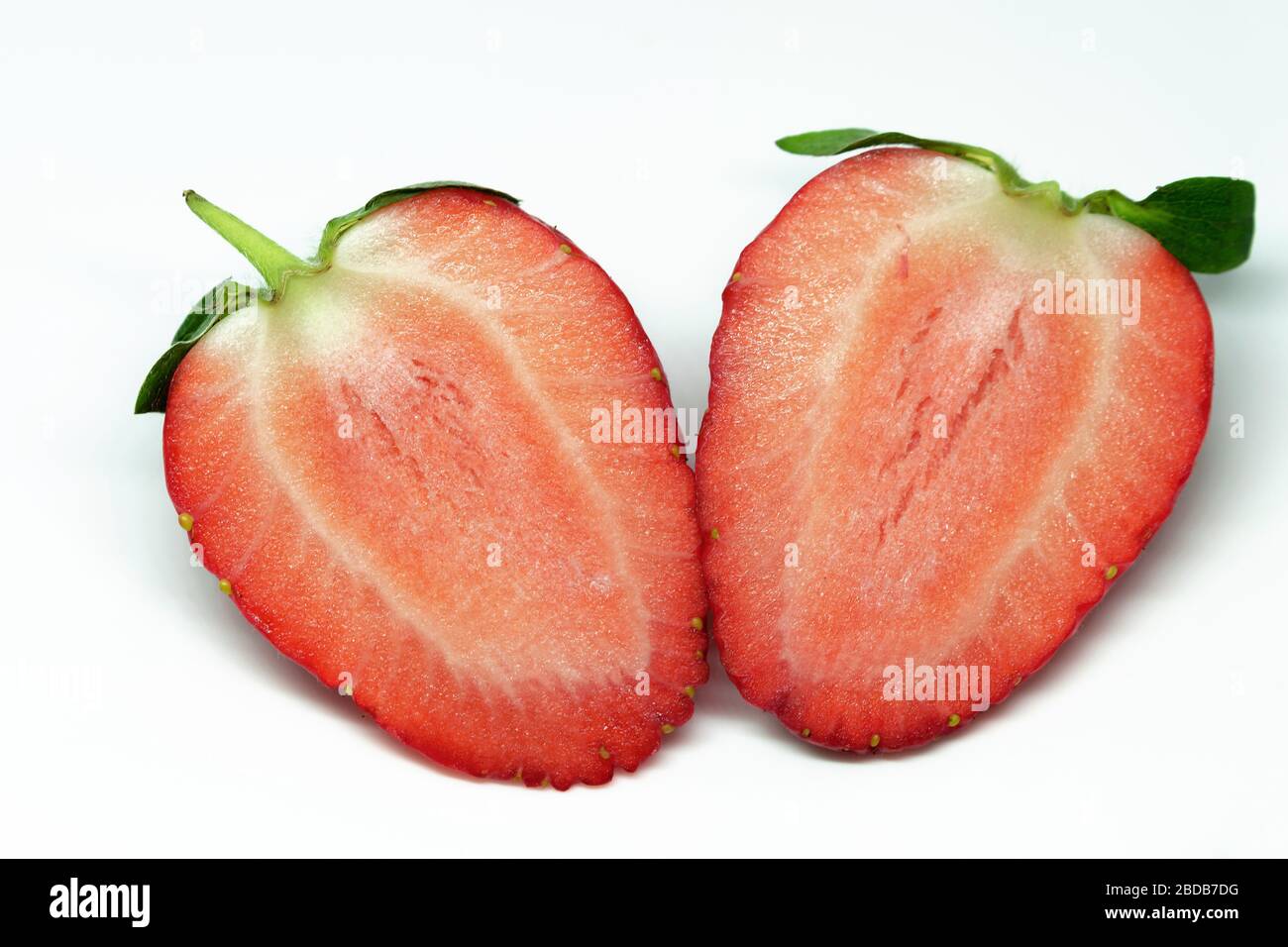 Strawberry in close-up. Red, ripe fruit on a white background. Spring ...
