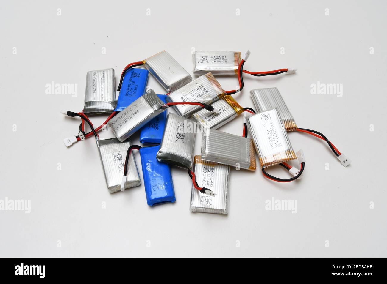 Bunch of small blue and grey drone li-po batteries Stock Photo - Alamy