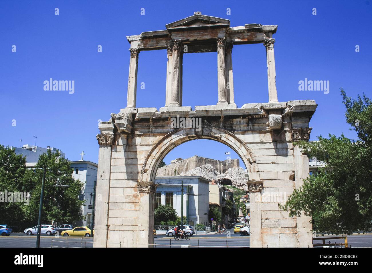 Ancient gate in Athens with city streets Stock Photo - Alamy