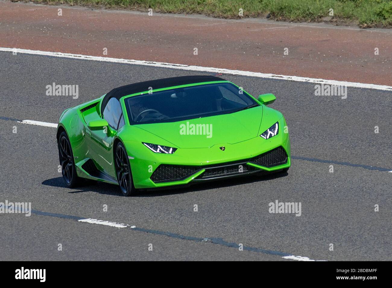 Neon green Lamborghini Aventador V12 : Vehicular traffic moving ...