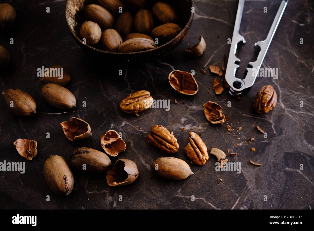 Fresh Pecan Nuts with husks Stock Photo - Alamy