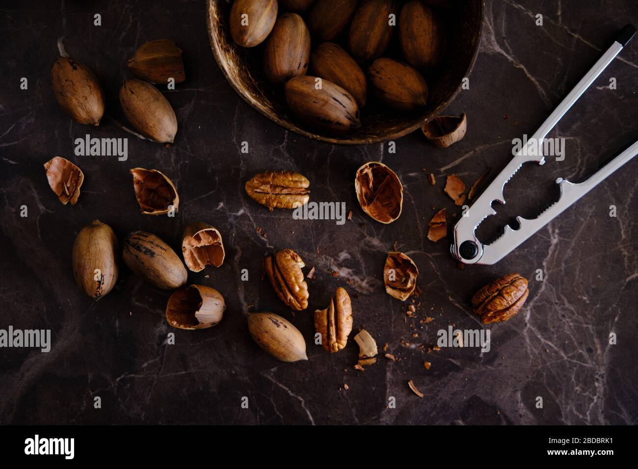 Fresh Pecan Nuts with husks Stock Photo - Alamy