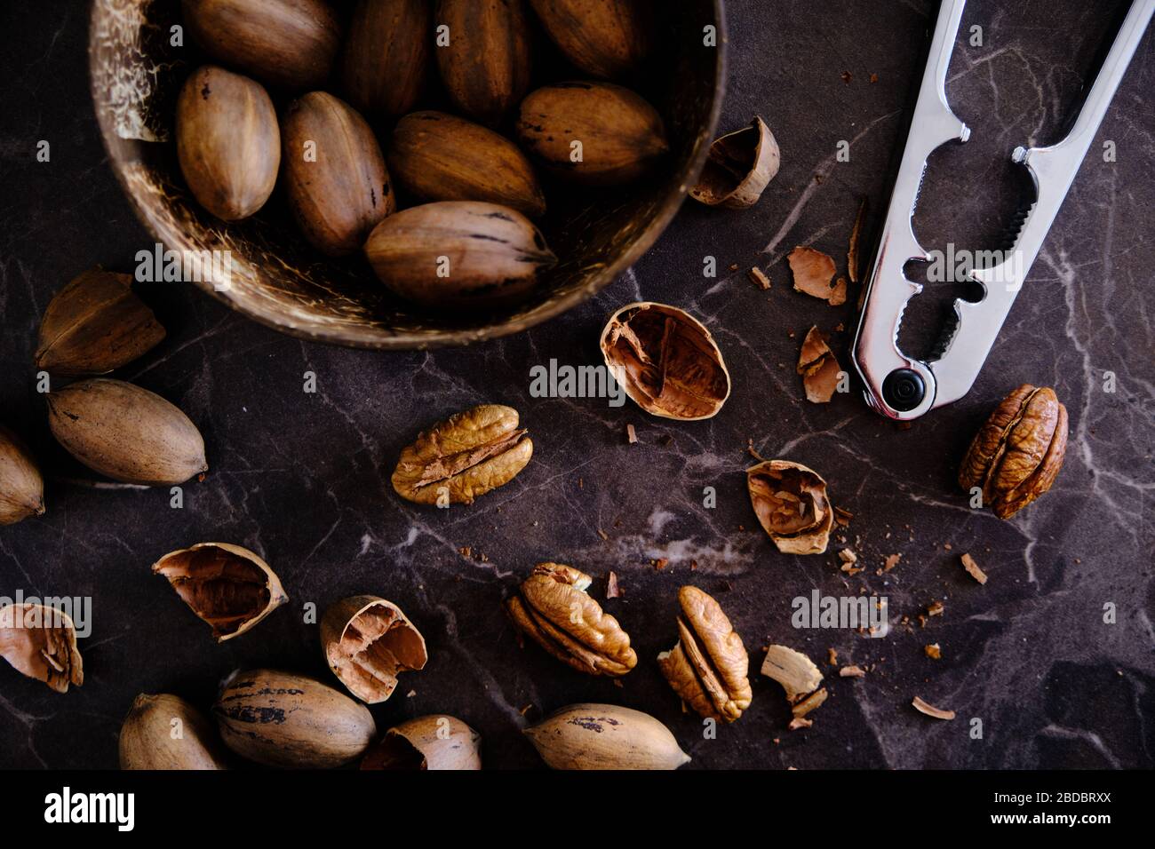 Fresh Pecan Nuts with husks Stock Photo - Alamy