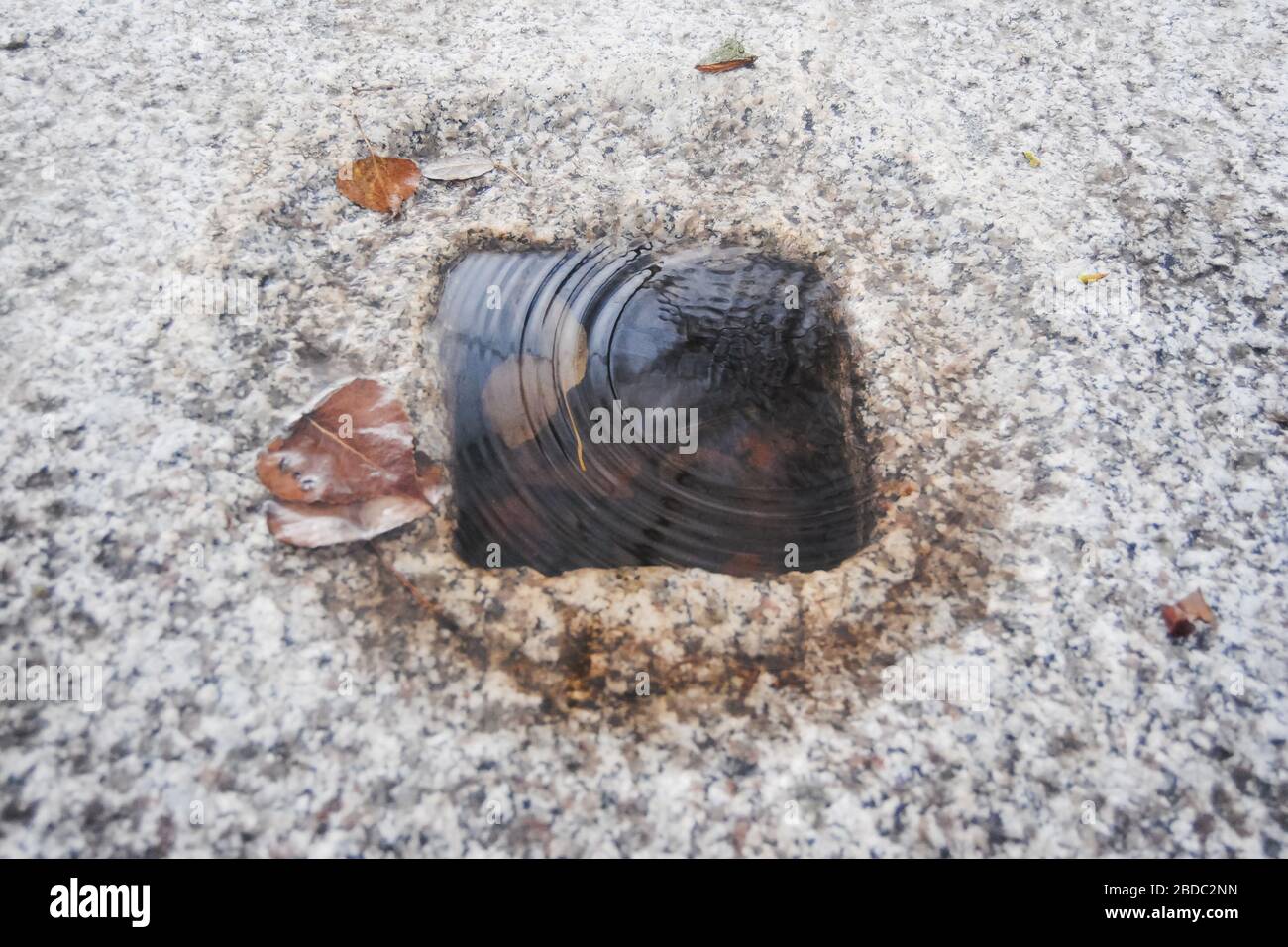 Movement of water ripples inside a stone in the countryside Stock Photo ...