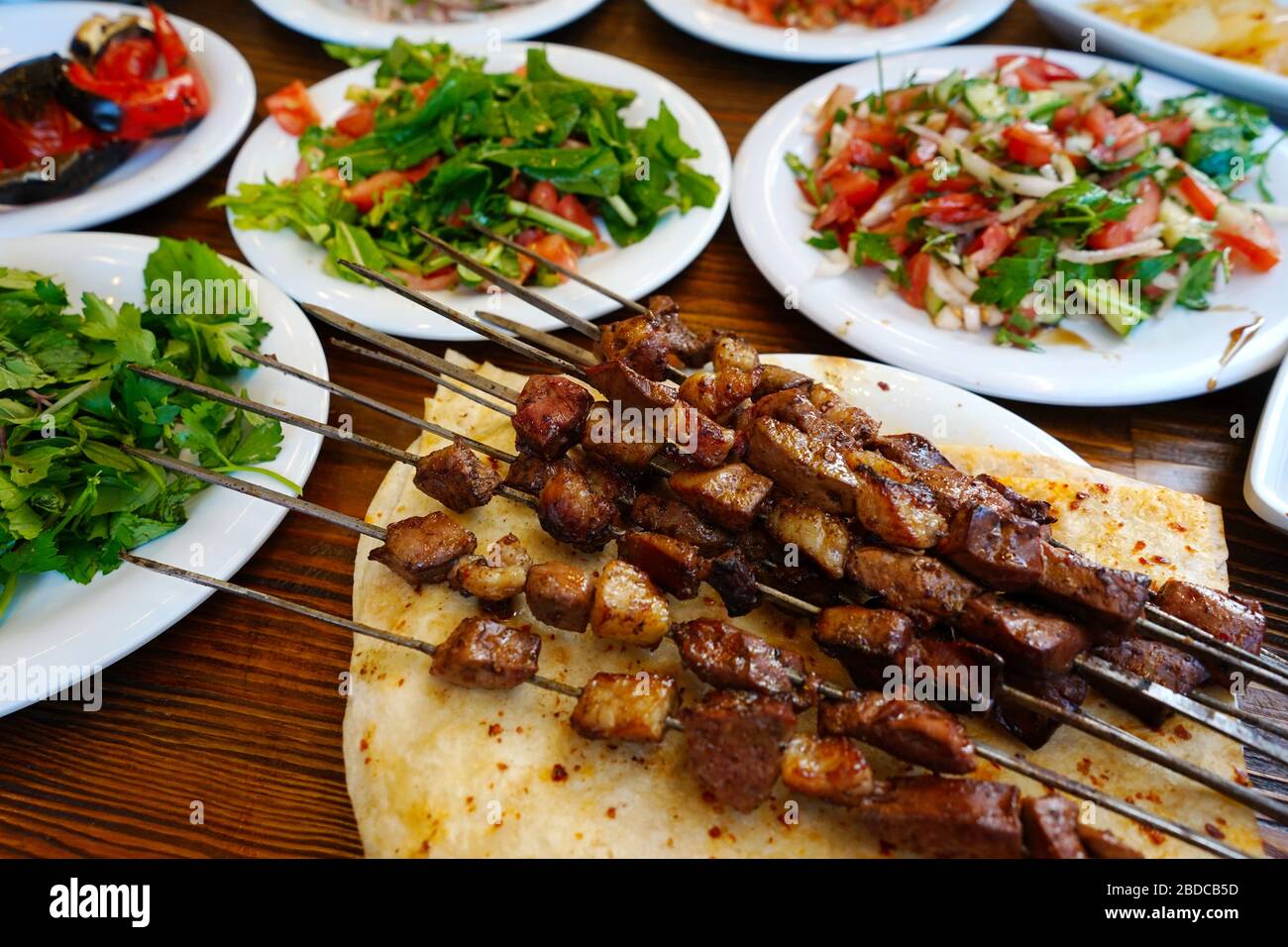 Liver kebab. the table is also served with Turkish appetizers and salad ...