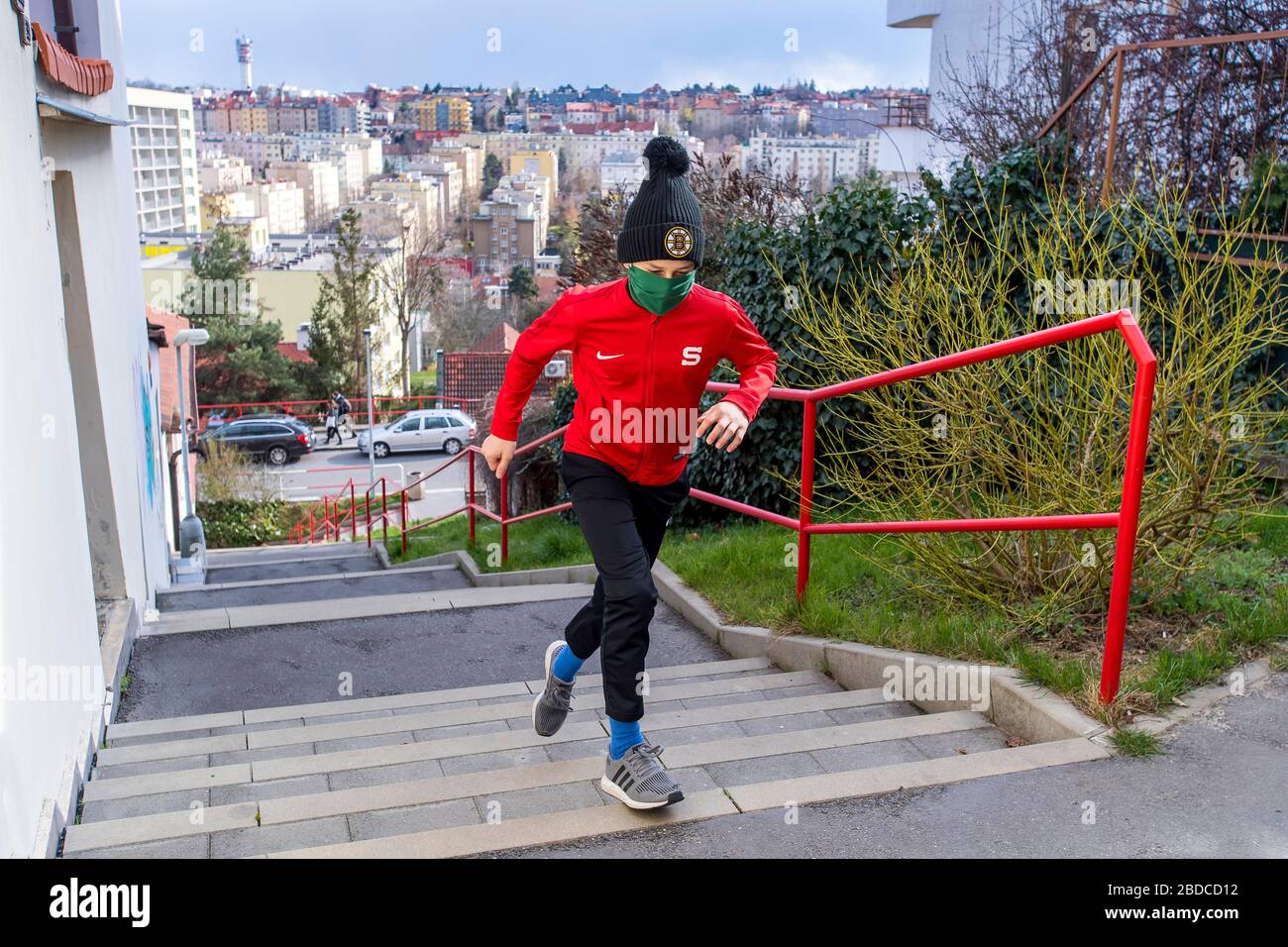 Boy running up stairs hi-res stock photography and images - Alamy