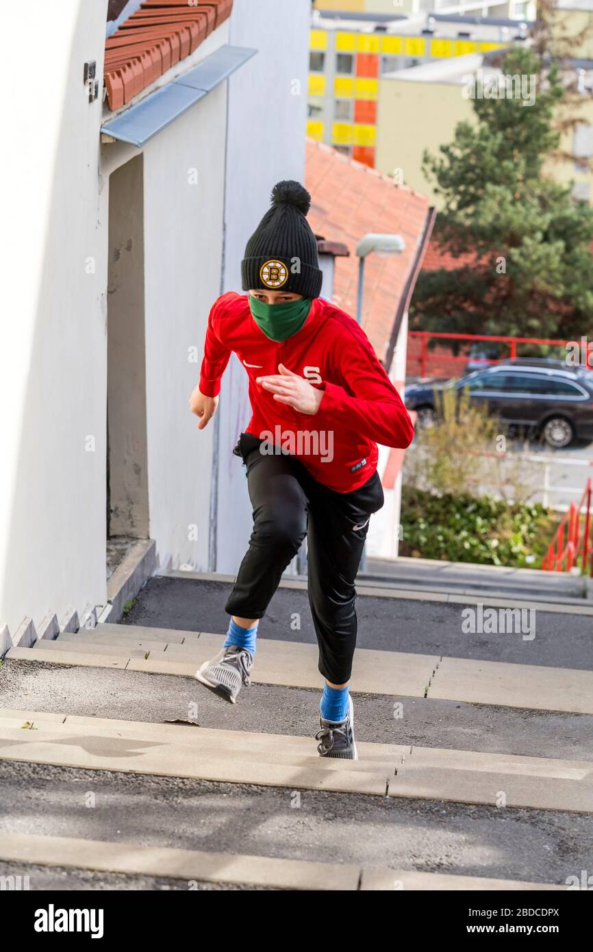 boy running upstairs with home made surgical mask Stock Photo - Alamy