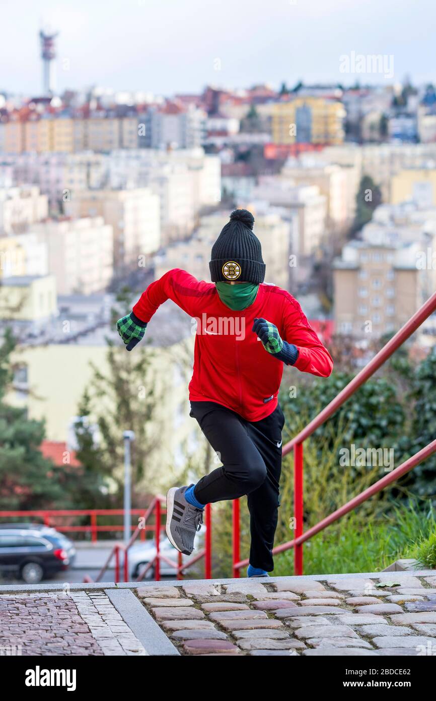 boy running upstairs with home made surgical mask Stock Photo - Alamy